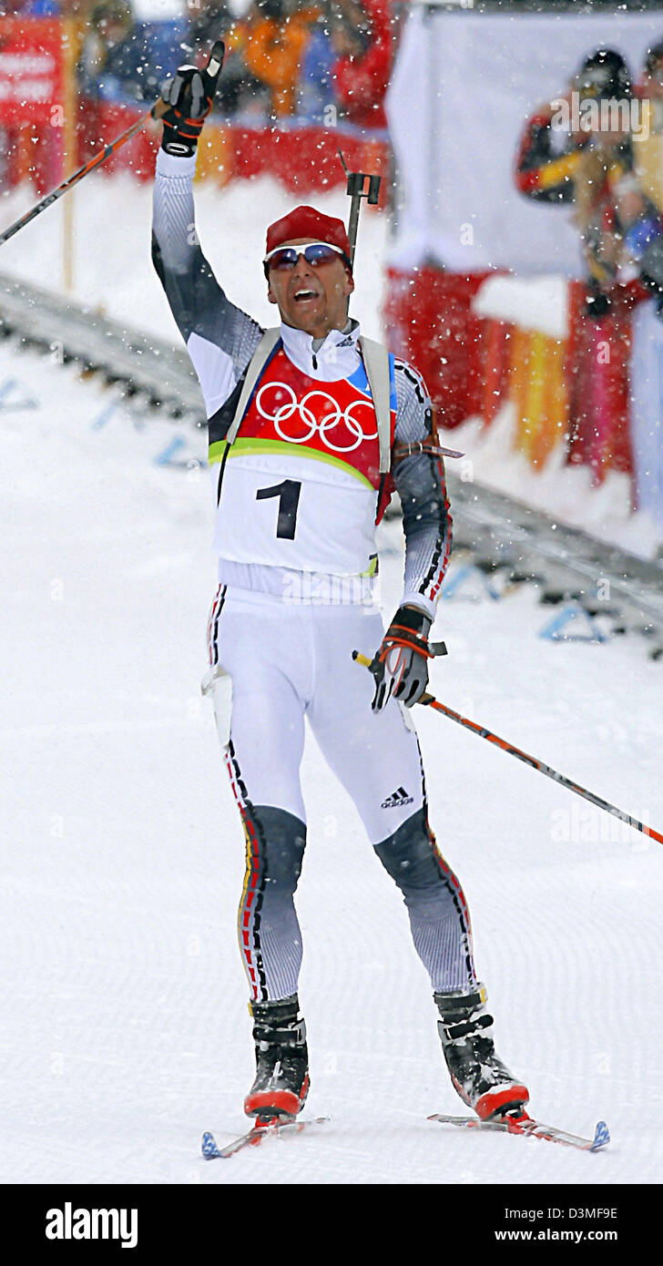German biathlete Michael Greis arrives at the finish in the 15 km mass ...