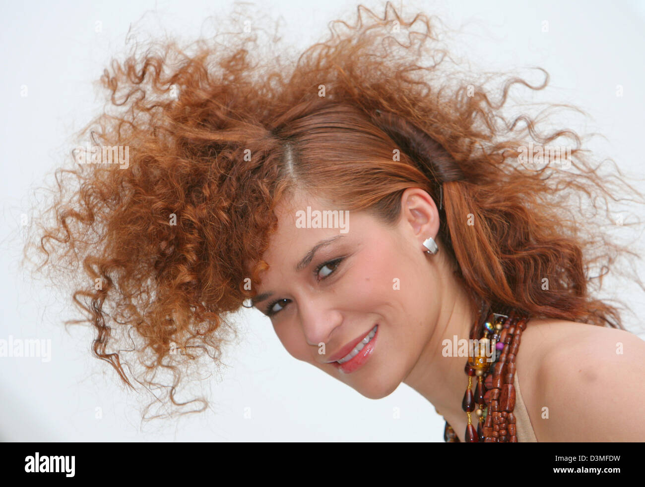 The picture shows model Natalie with her new hairstyle during a photo ...