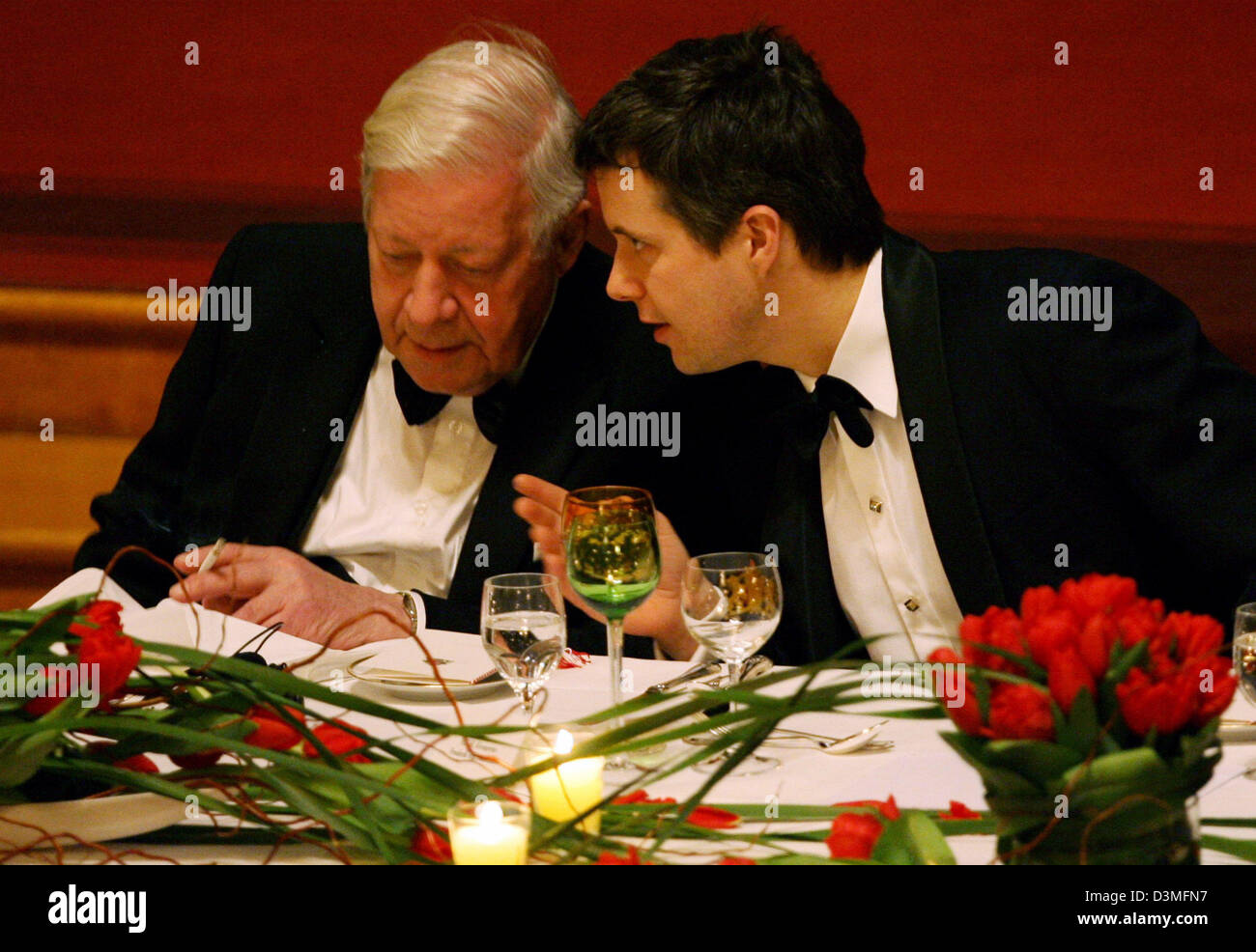 Denmark's Crown Prince Frederik (R) sits next to fomer German ...