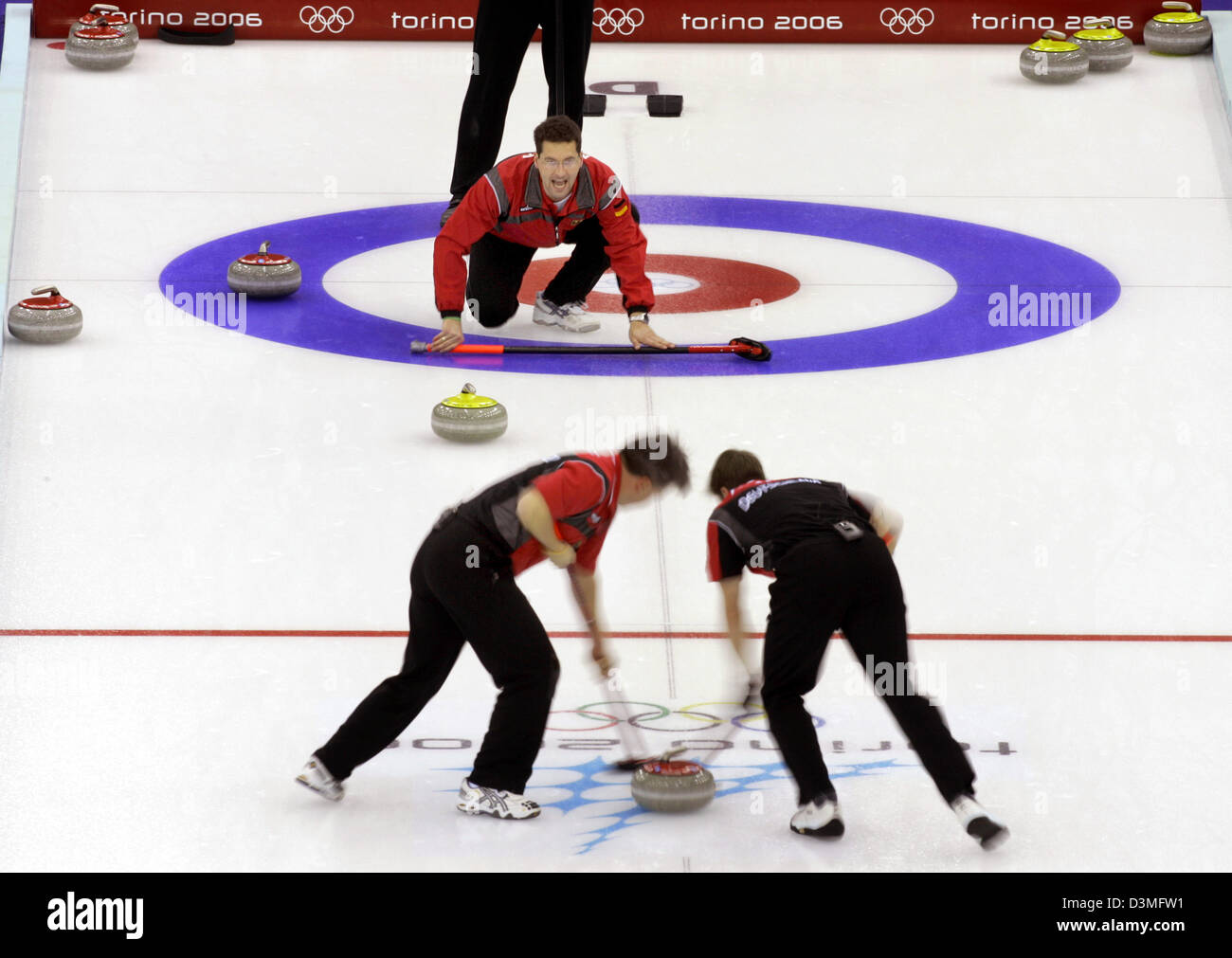 The German curling team (L-R) Oliver Axnick, Uli Kapp and Andreas Kempf ...