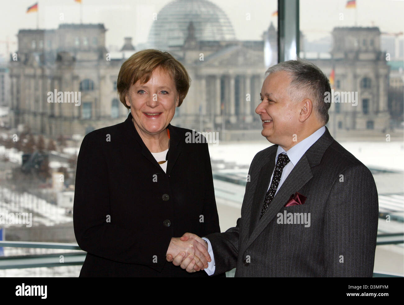 German Chancellor Angela Merkel (L) and Poland's President Lech ...