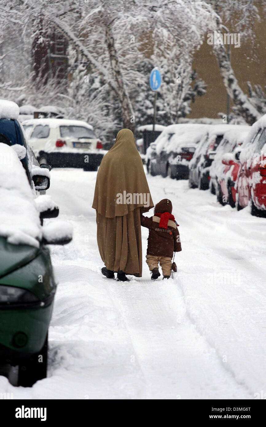 Back view muslim women walking hi-res stock photography and images - Alamy