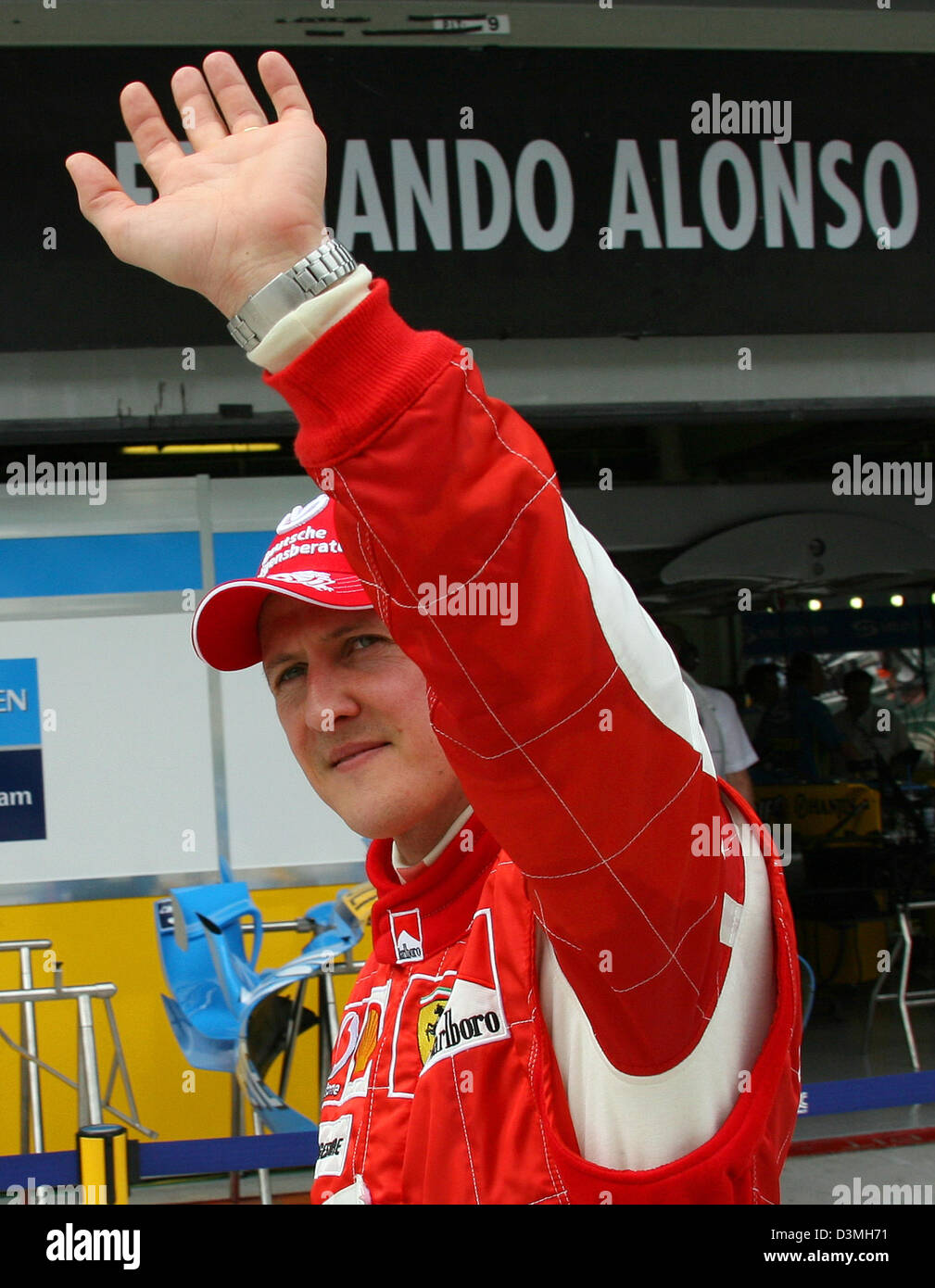 German Formula One driver Michael Schumacher of Ferrari's F1 team waves ...