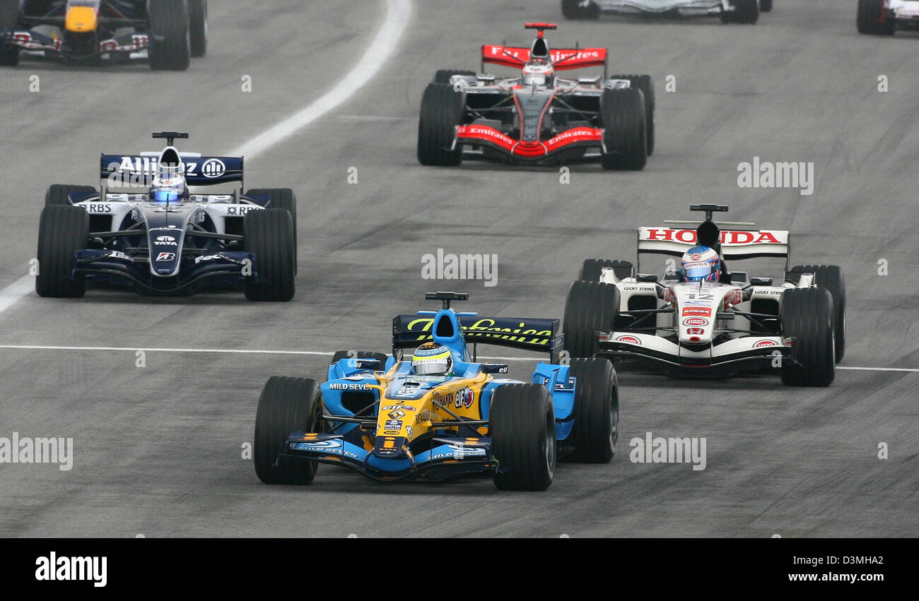 Italian Formula One driver Giancarlo Fisichella (FRONT)foreground leads ...