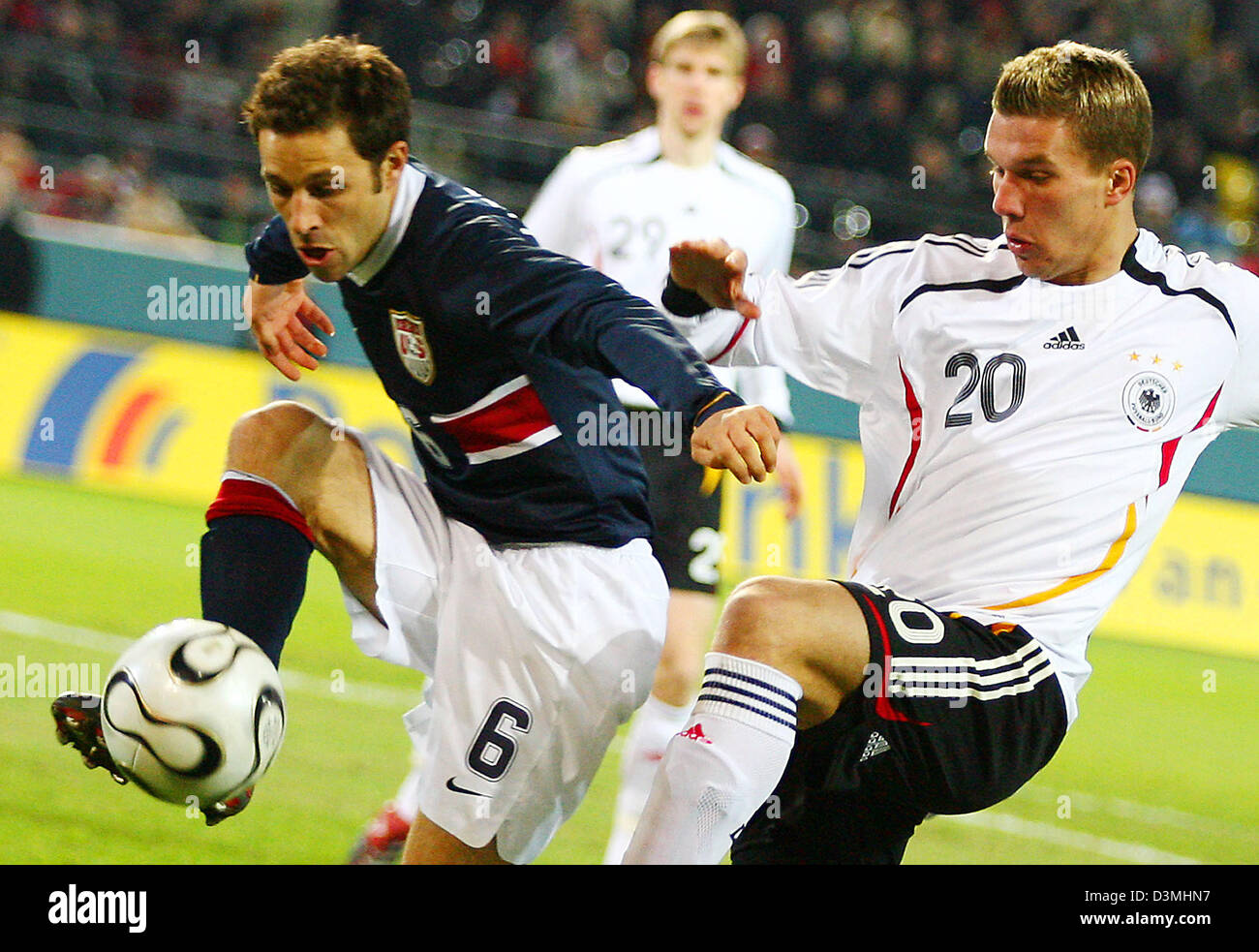 German national soccer player Lukas Podolski (R) and US American Steven ...