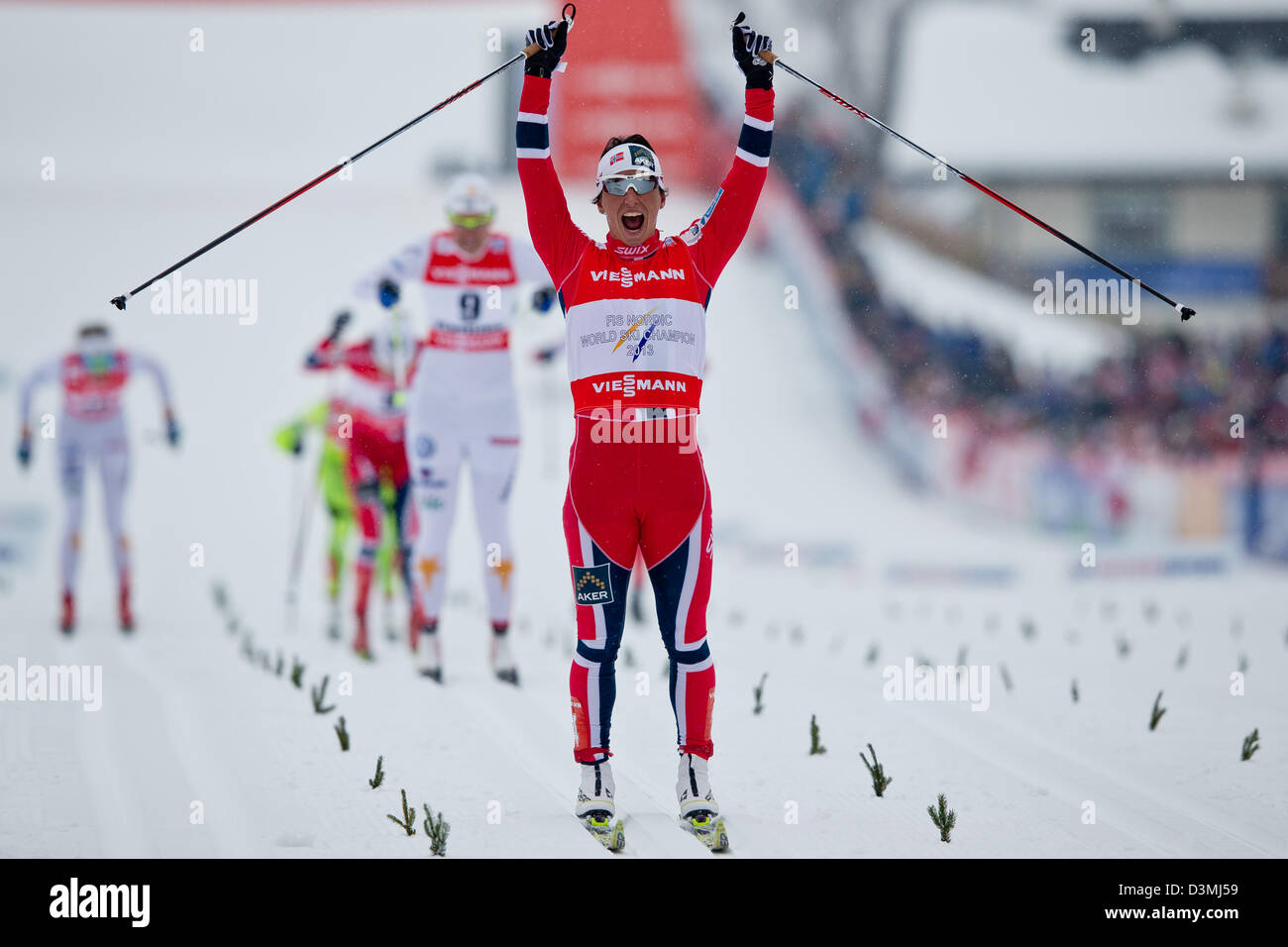 Marit Bjoergen of Norway reacts after winning the Cross Country women's ...