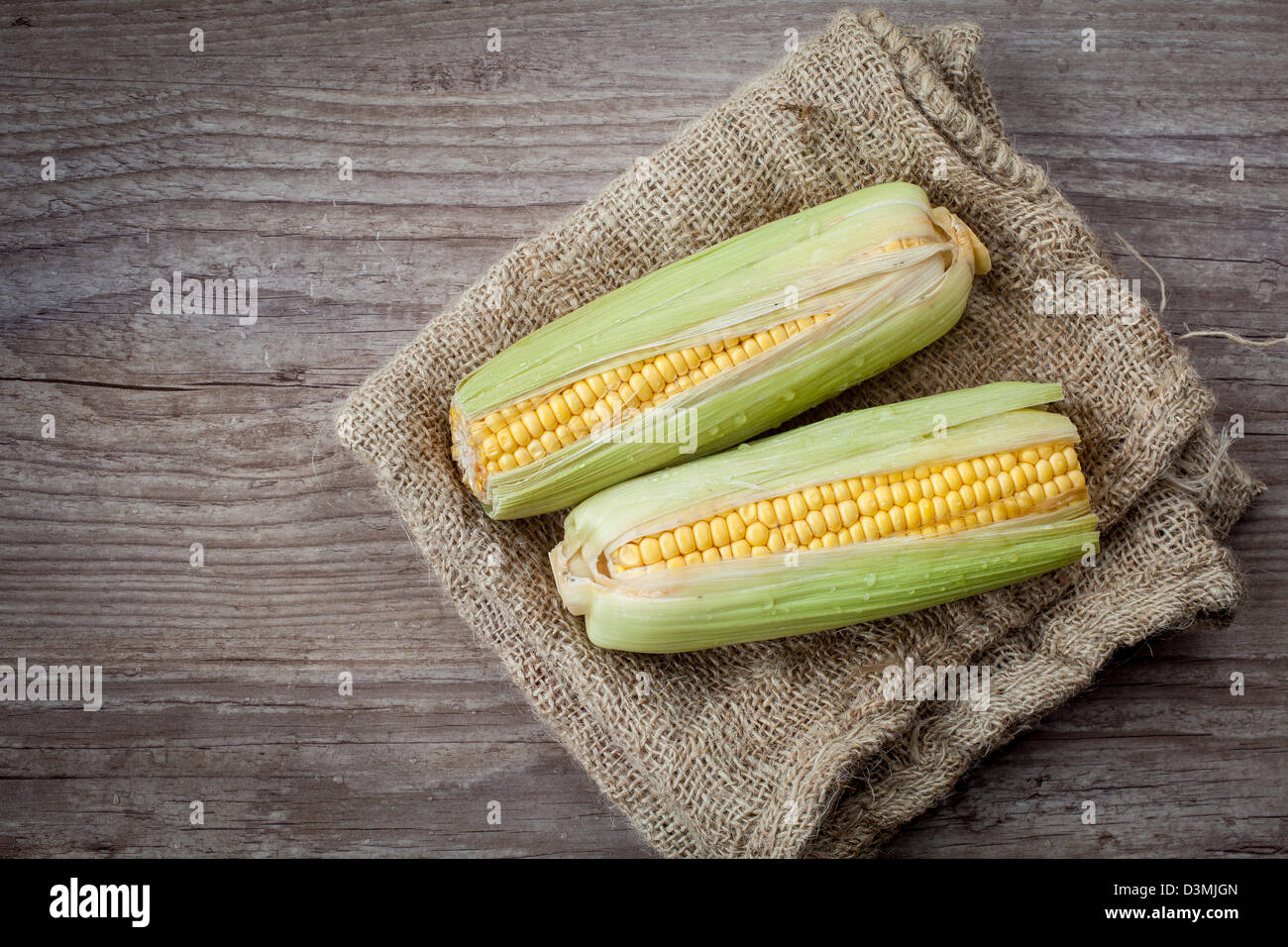 Assortment of fresh corn on wood background Stock Photo - Alamy