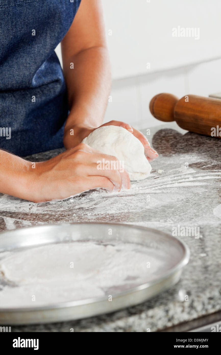 Women knead flour rolling pin hi-res stock photography and images - Alamy