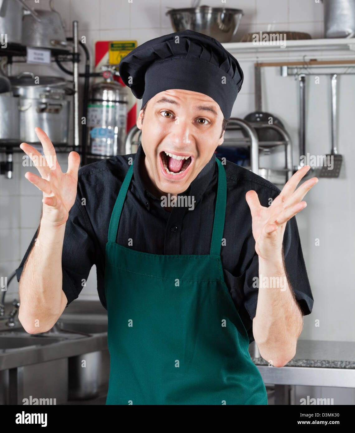 Male Chef Shouting In Restaurant Kitchen Stock Photo - Alamy