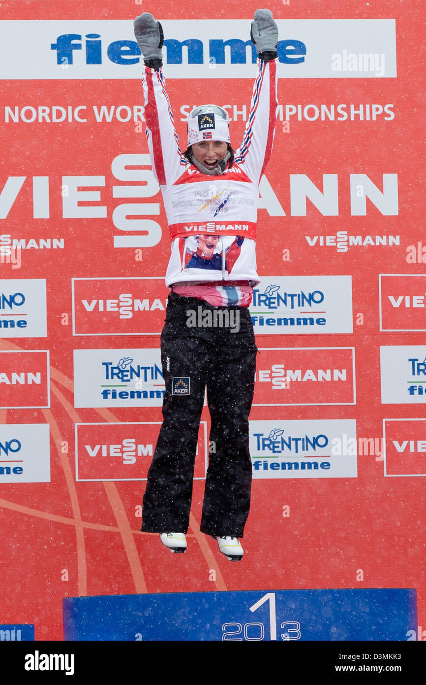 Marit Bjoergen of Norway celebrates on the podium after winning the ...