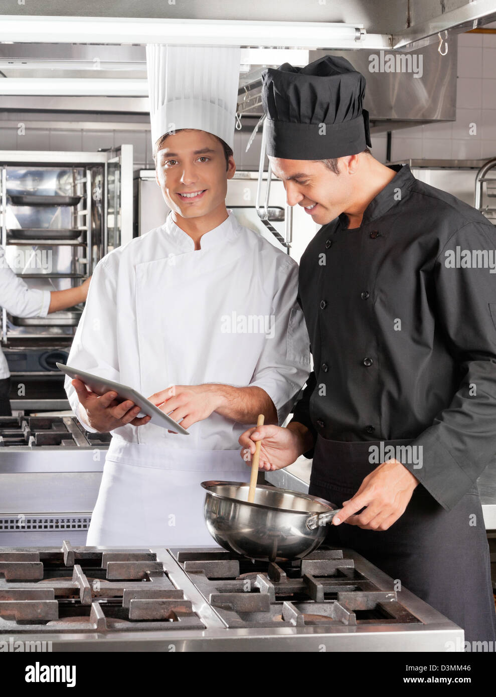 Chefs With Digital Computer Cooking Food Stock Photo - Alamy