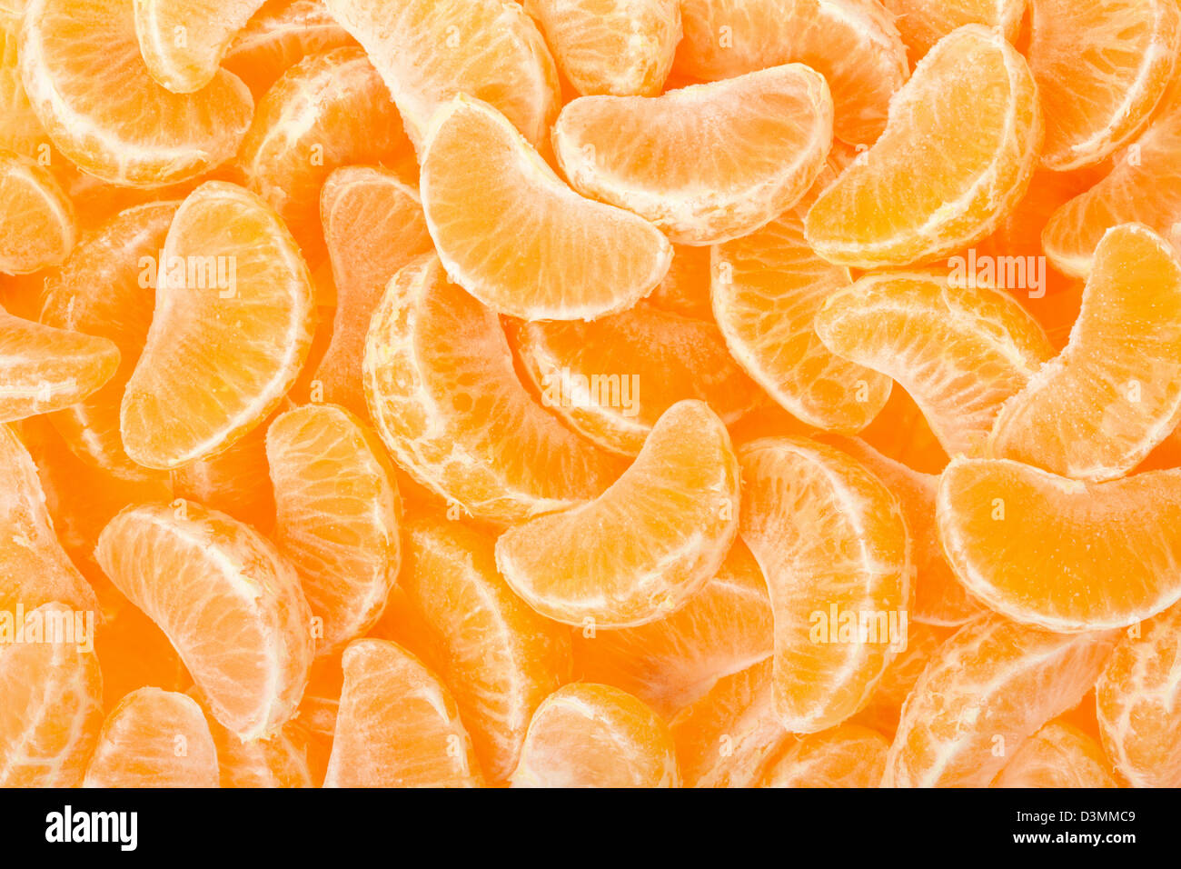 Tangerine segments texture background Stock Photo - Alamy