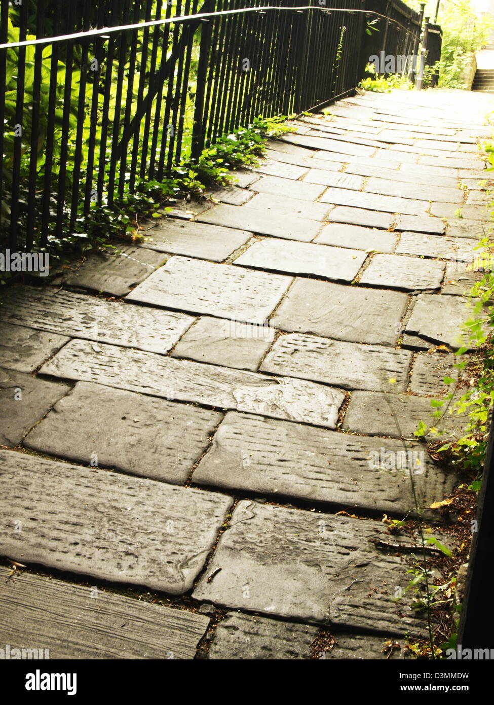 Iron railings footpath hi-res stock photography and images - Alamy