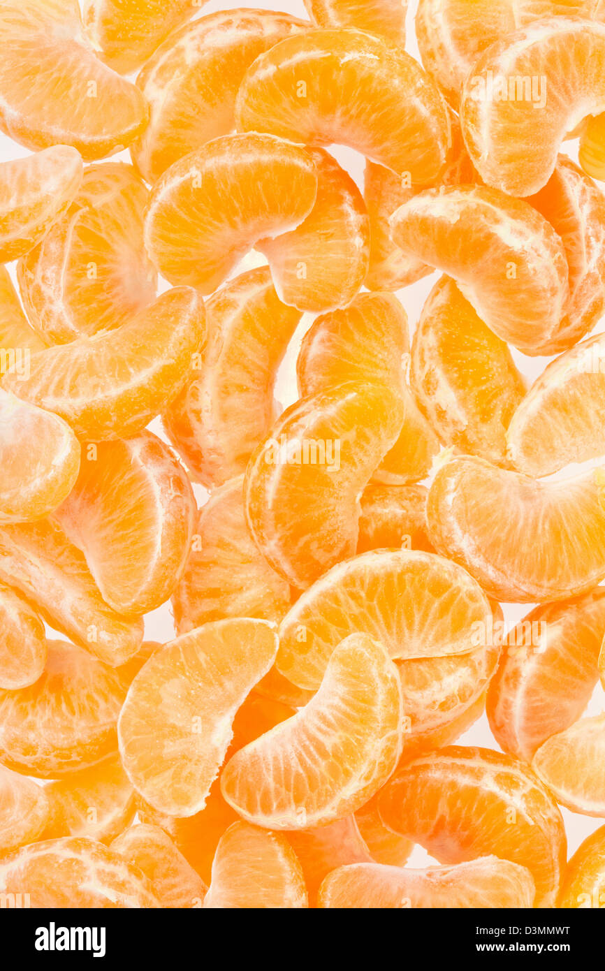 Tangerine segments texture background Stock Photo - Alamy