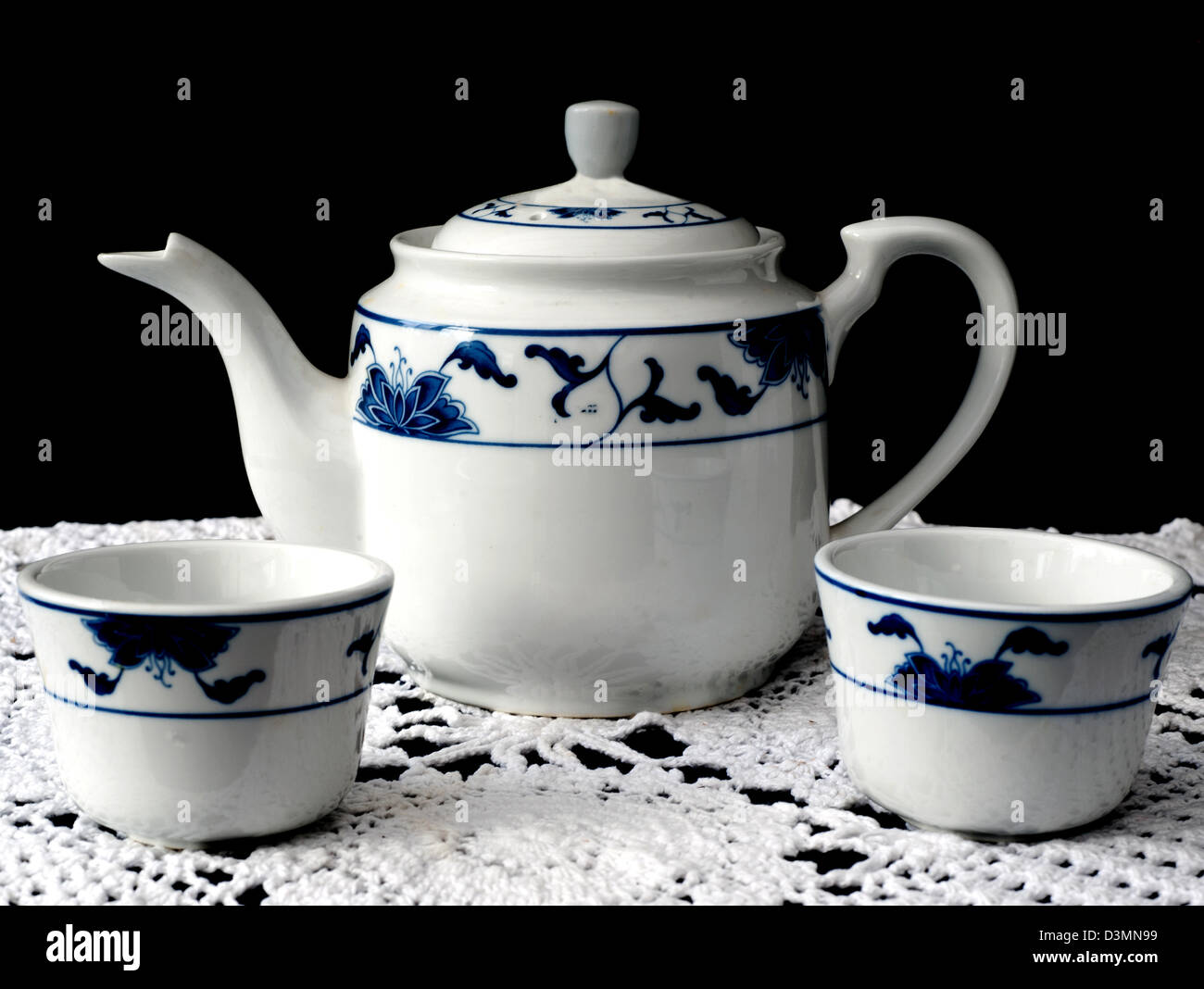 Chinese tea set in white with blue flower motif Stock Photo - Alamy