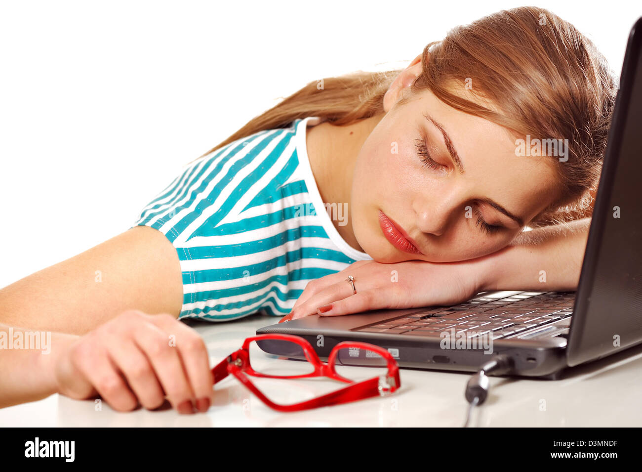 girl sleeping on her laptop Stock Photo - Alamy