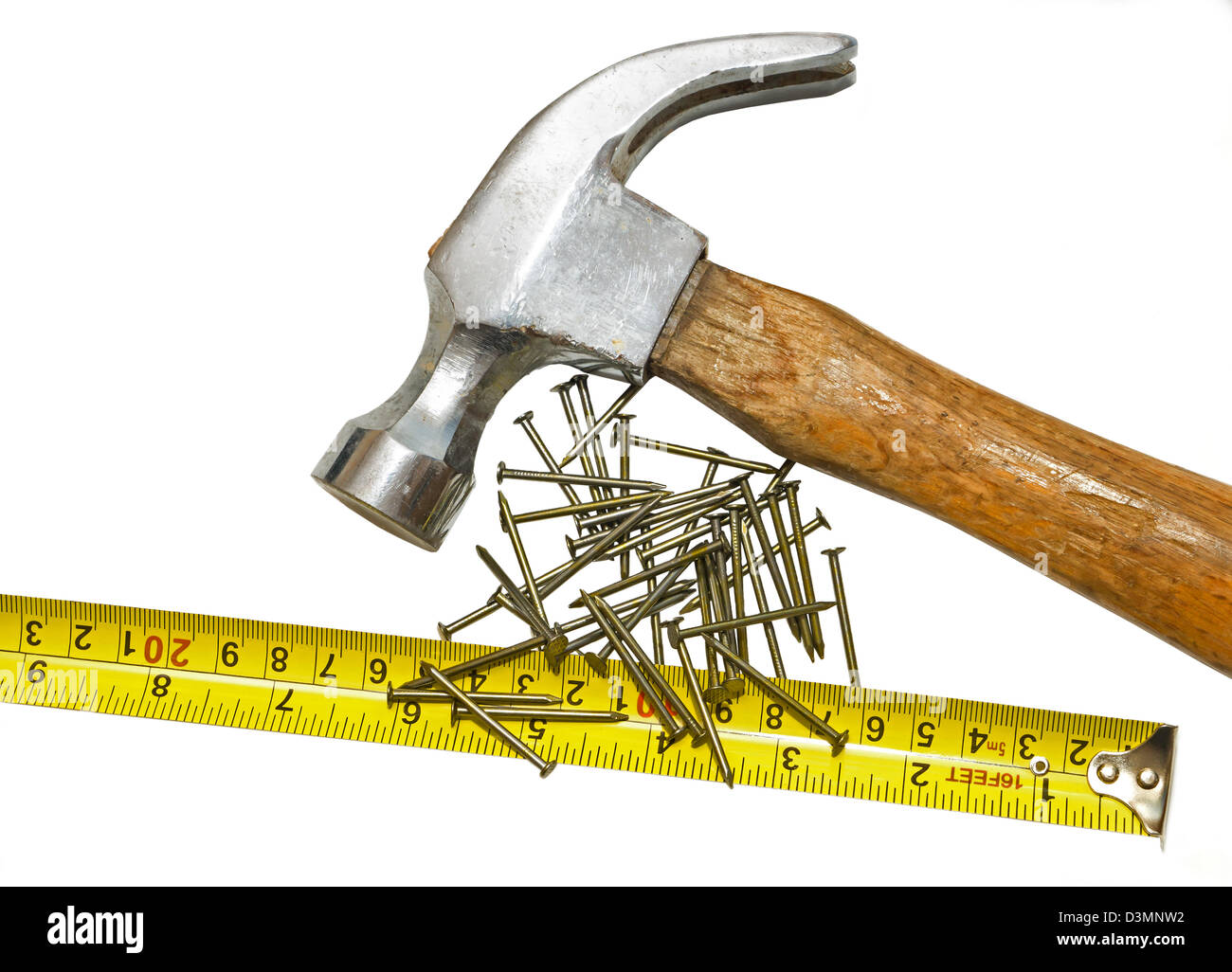 Hammer, nails and a measuring tape on a white background Stock Photo ...