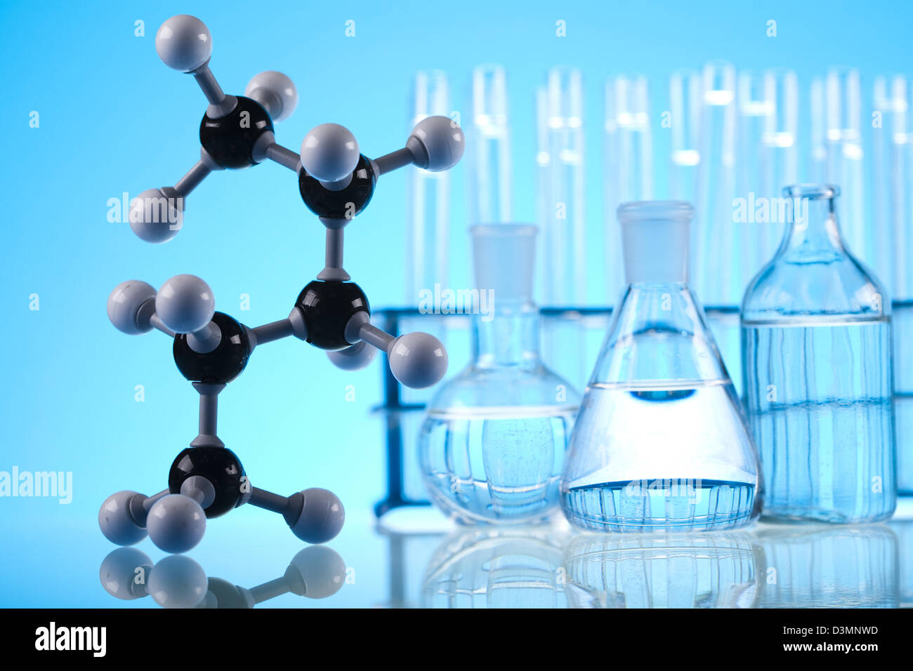 Molecular model and flasks in laboratory Stock Photo - Alamy