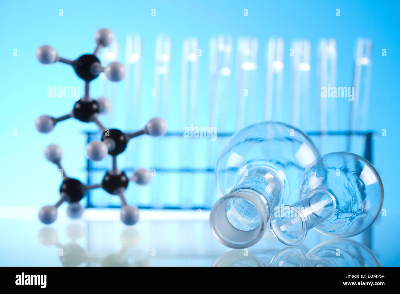 Molecular model and flasks in laboratory Stock Photo - Alamy