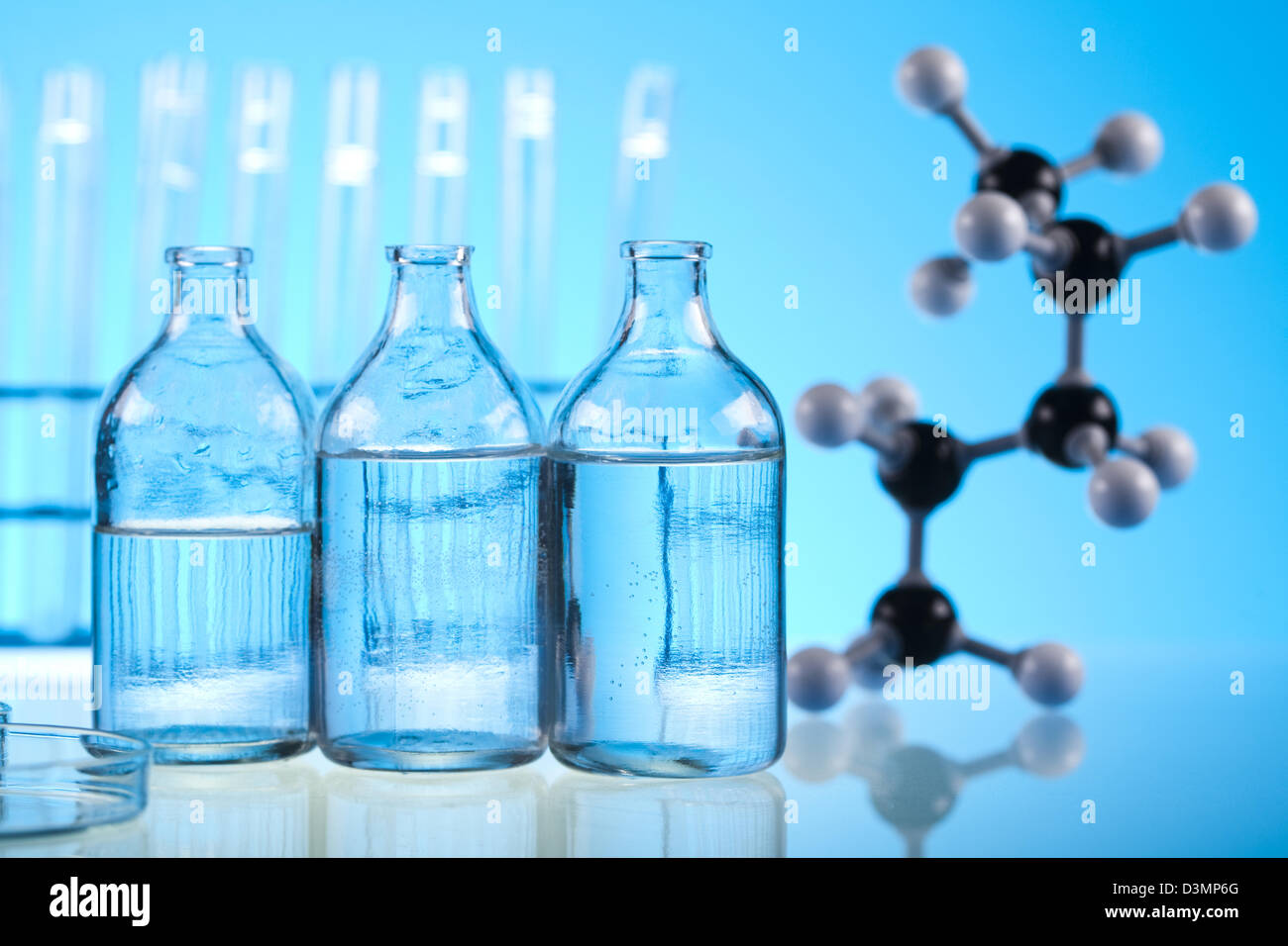 Molecular model and flasks in laboratory Stock Photo - Alamy