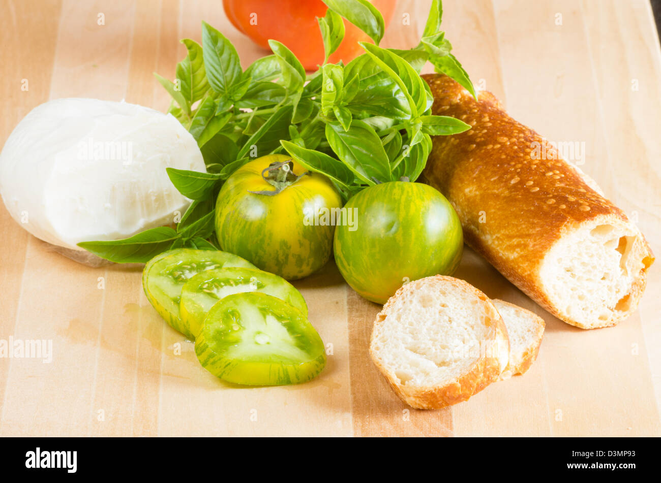 Fresh mozzarella cheese with tomatoes and bread Stock Photo - Alamy
