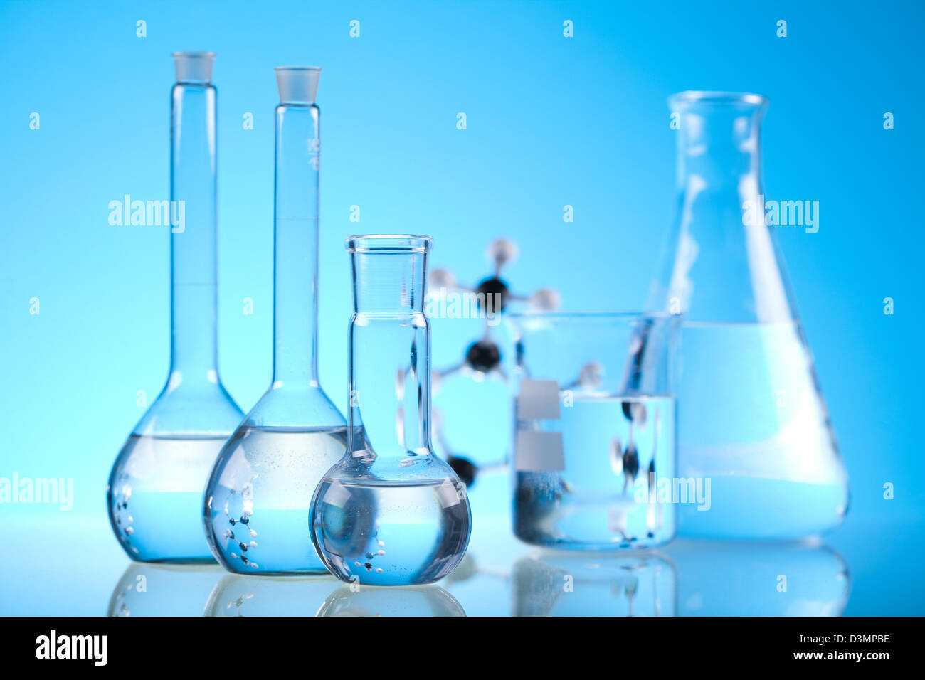 Molecular model and flasks in laboratory Stock Photo - Alamy