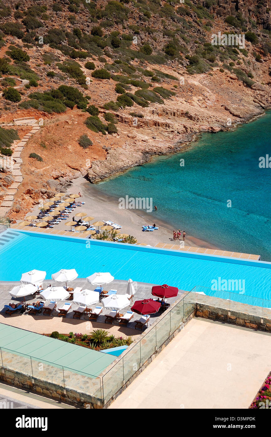 Swimming pool with a view on beach at the luxury hotel, Crete, Greece ...