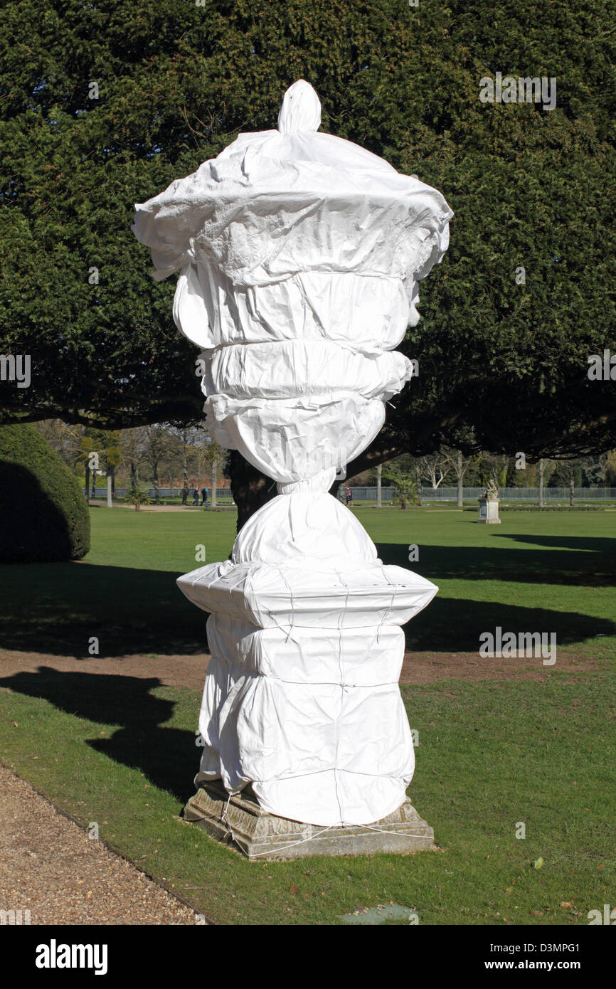 Stone statues with protective covering during winter. Hampton Court ...