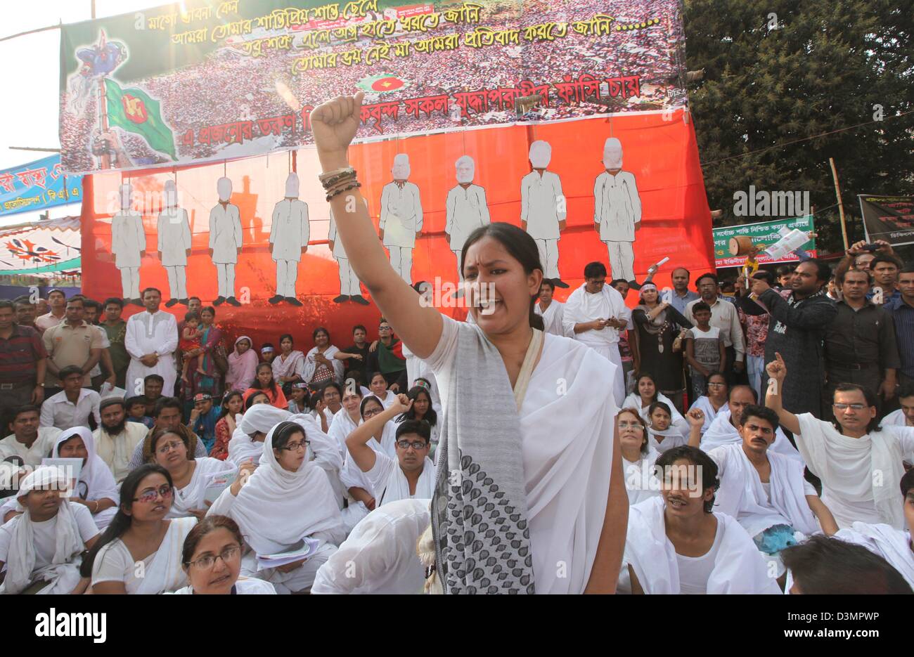 Dhaka, Bangladesh. 21st February 2013. A Bangladeshi protester shouts ...