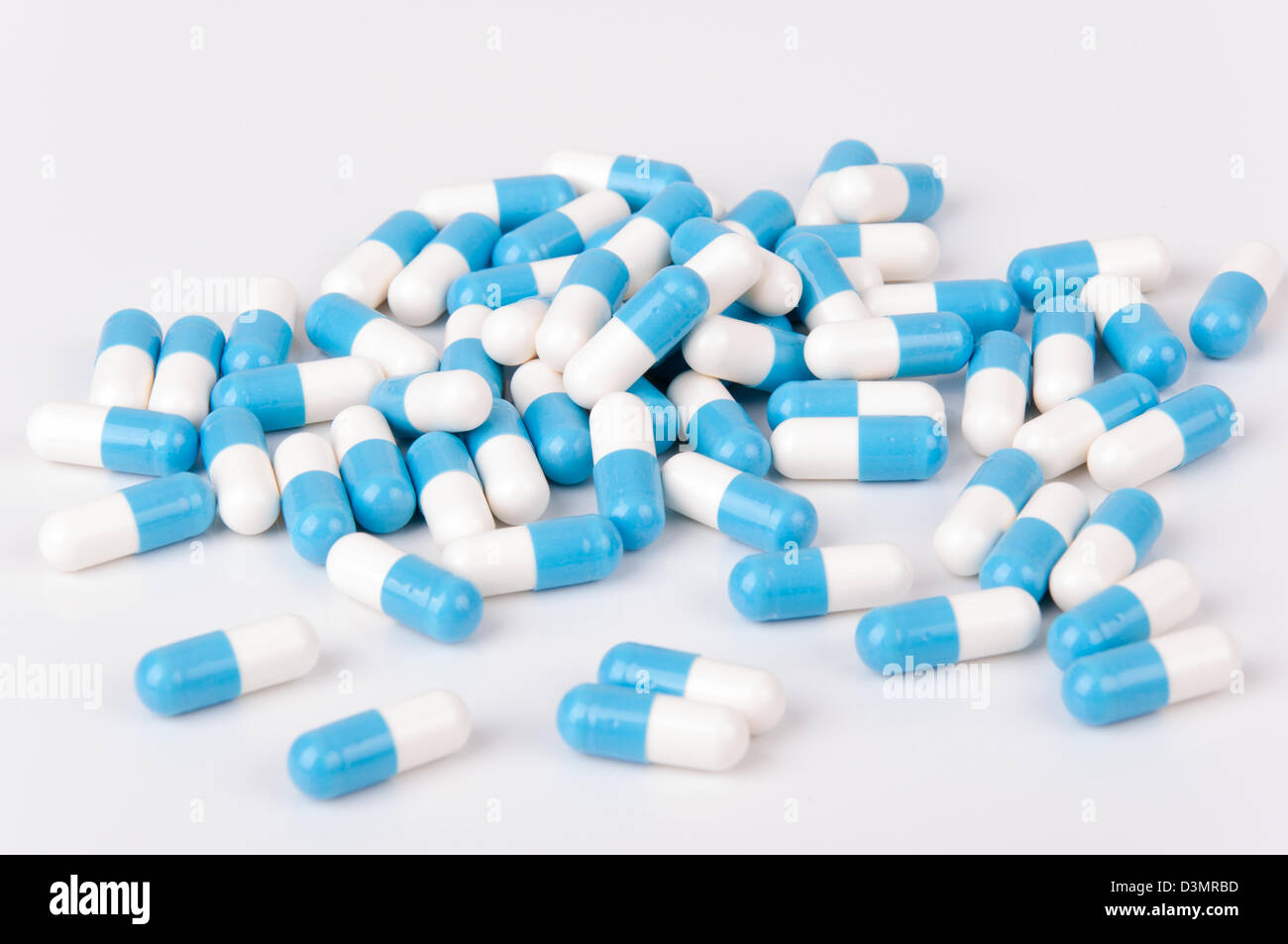 Capsules of medicament on white background Stock Photo - Alamy
