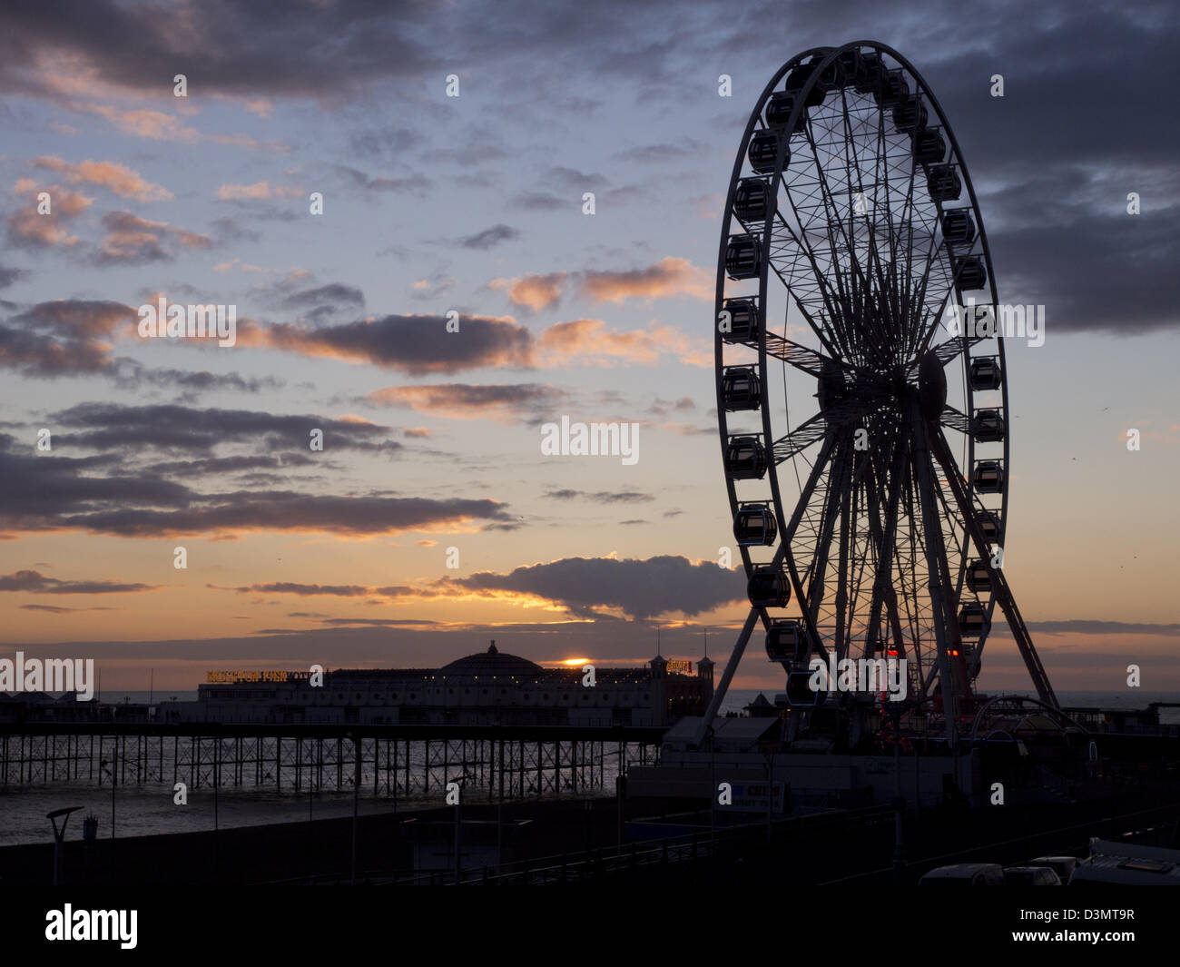 Brighton Eye and Brighton Pier at sunset, Sussex, UK Stock Photo - Alamy