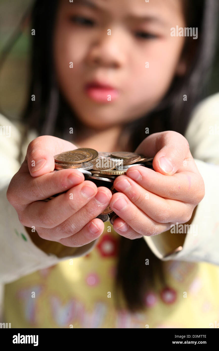 money in a child hand Stock Photo - Alamy