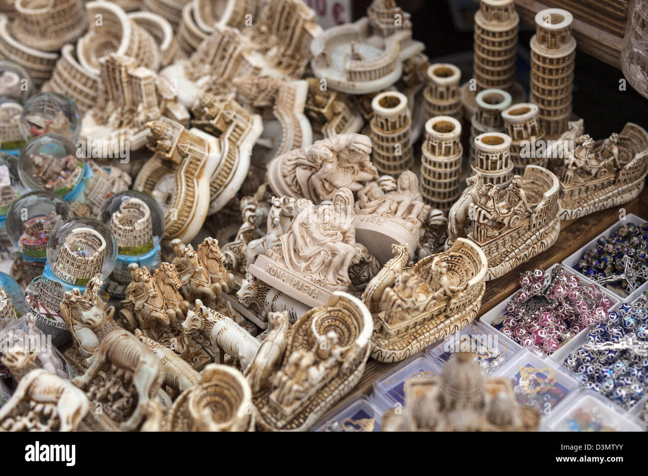Tacky souvenirs for tourists on sale next toe ancient roman forum ruins ...
