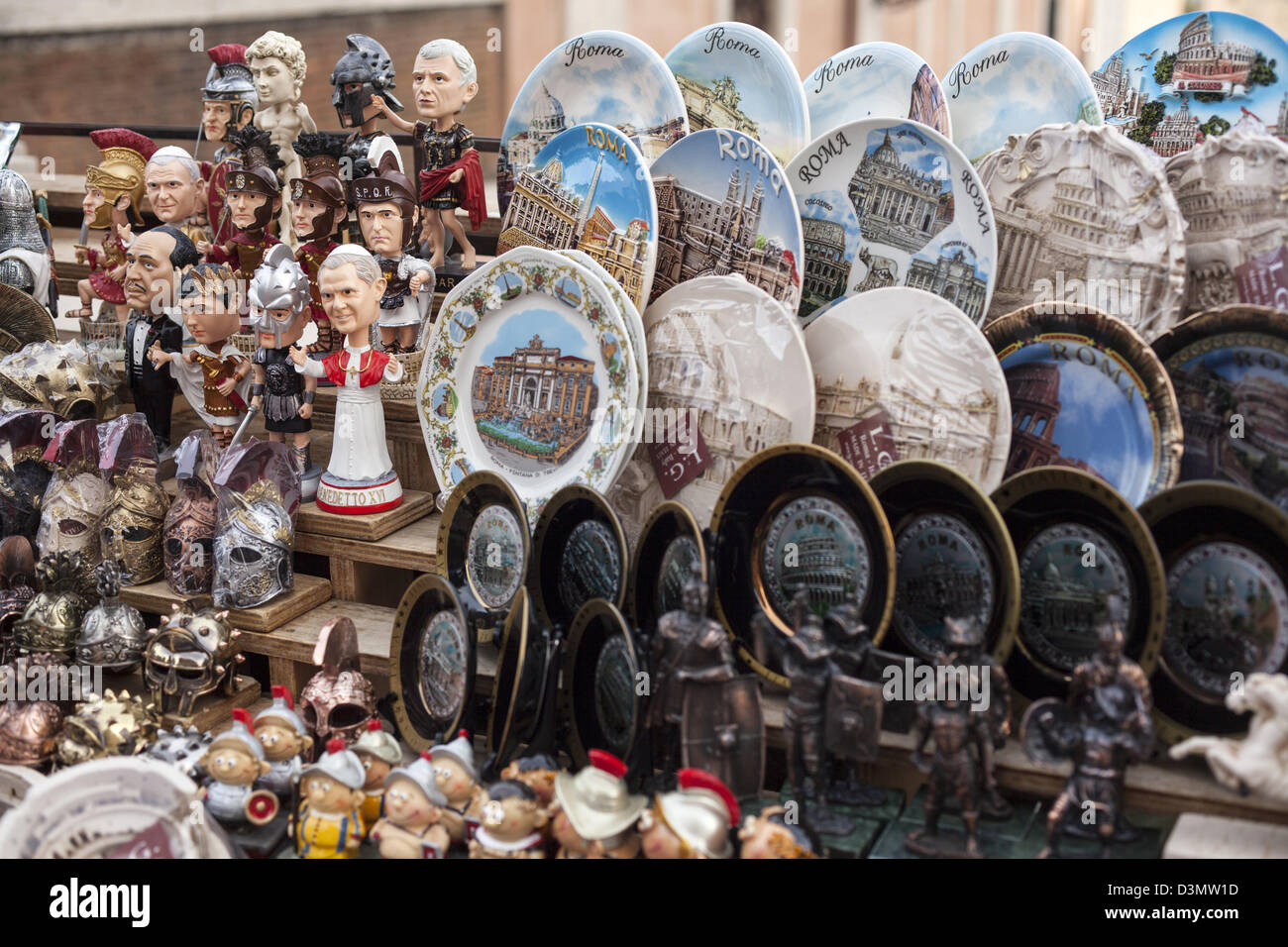Tacky souvenirs for tourists on sale next toe ancient roman forum ruins ...