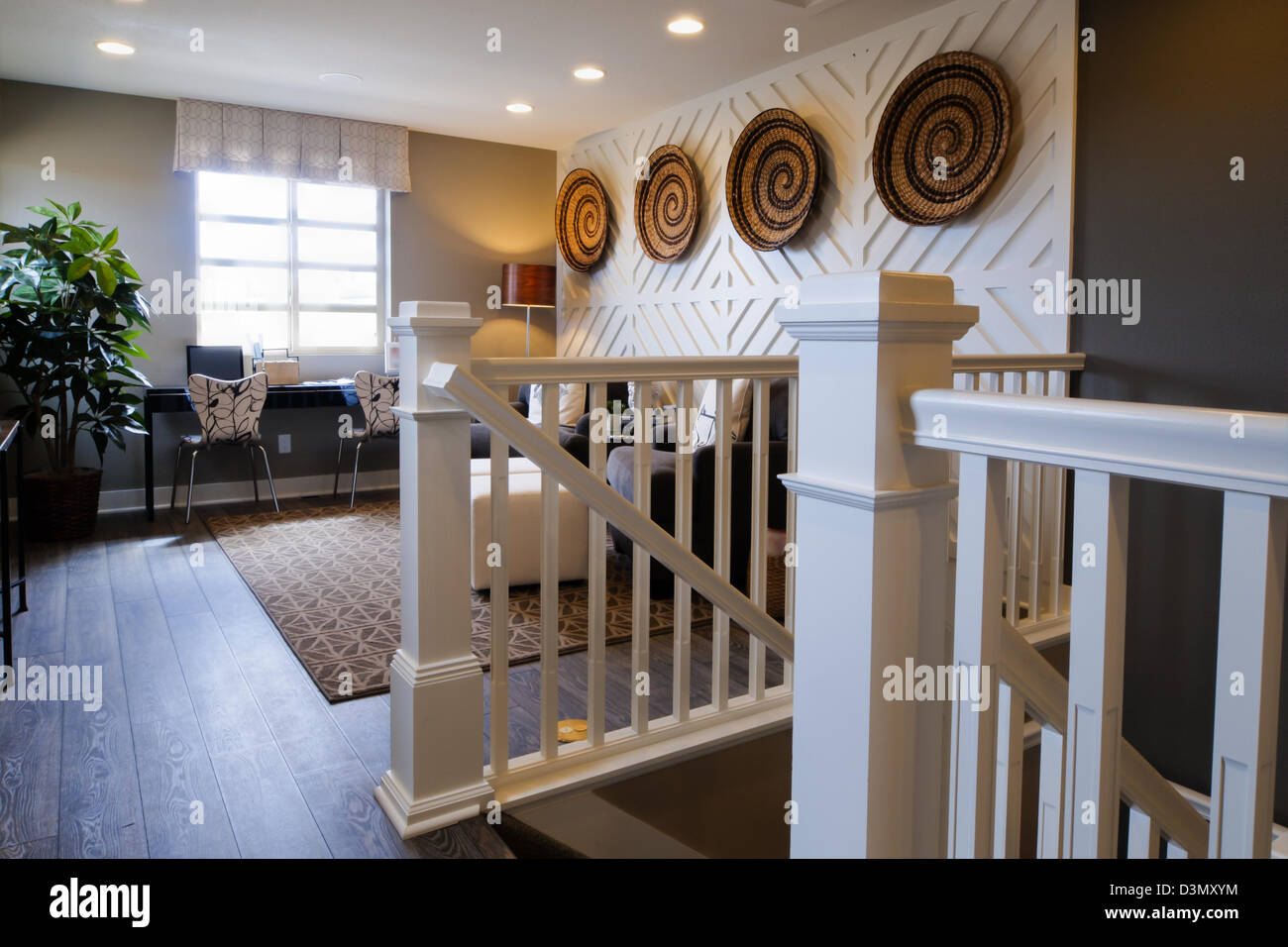 Modern living room with couch and coffee table on second floor of the ...