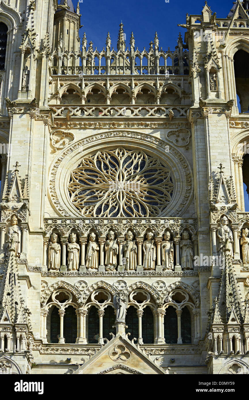 Gothic statues and the facade of the Gothic Cathedral of Notre-Dame ...
