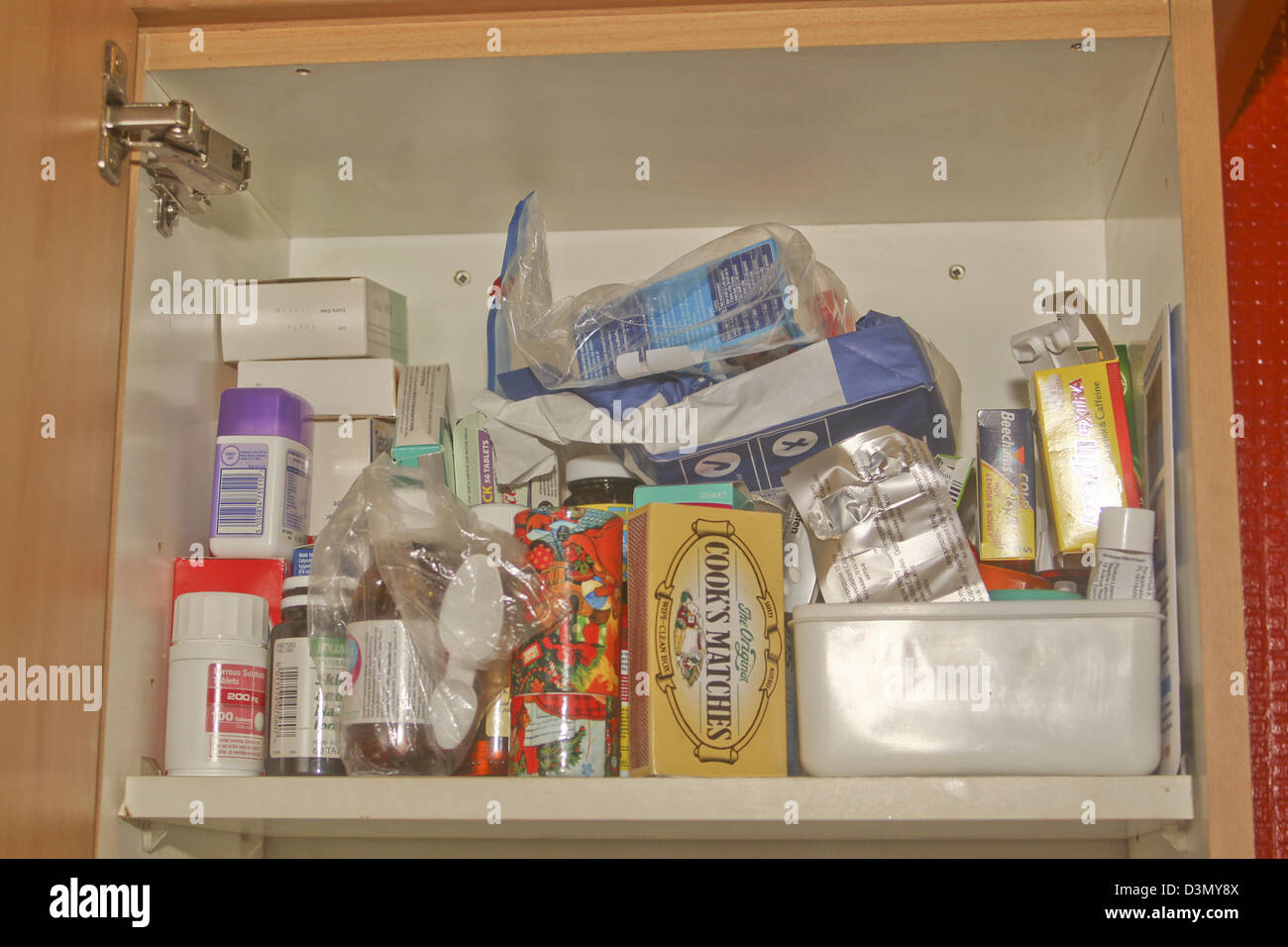 Inside of kitchen cupboard with supplements and medicines Stock Photo ...