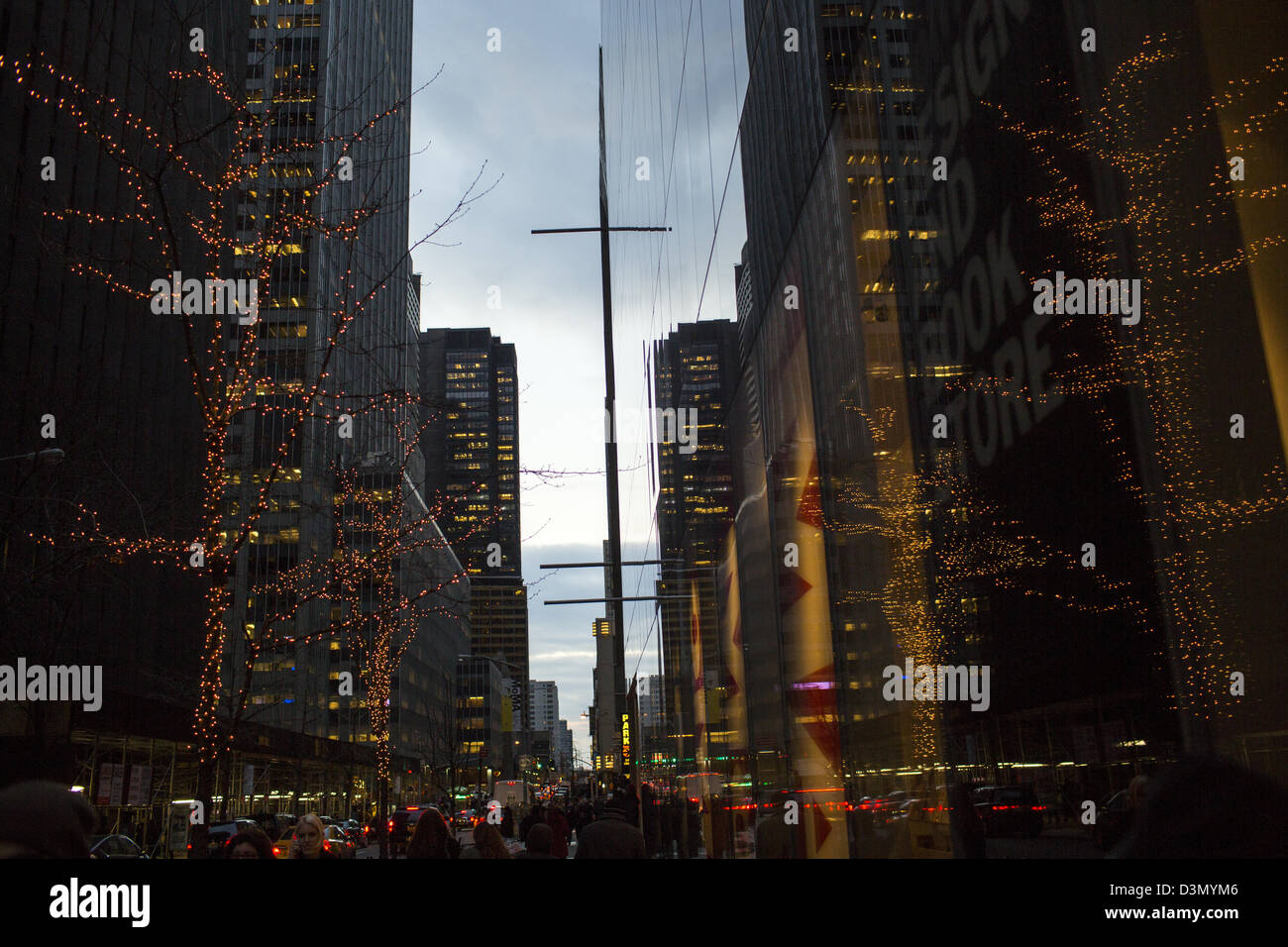 A view of West 52nd Street at sunset in front of the Museum of Modern ...