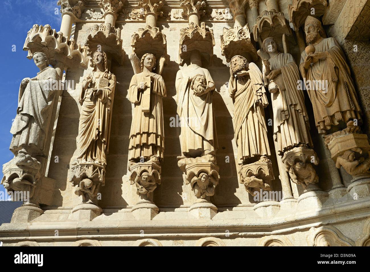 Gothic statues of an array of saints. Gothic Cathedral of Notre-Dame ...