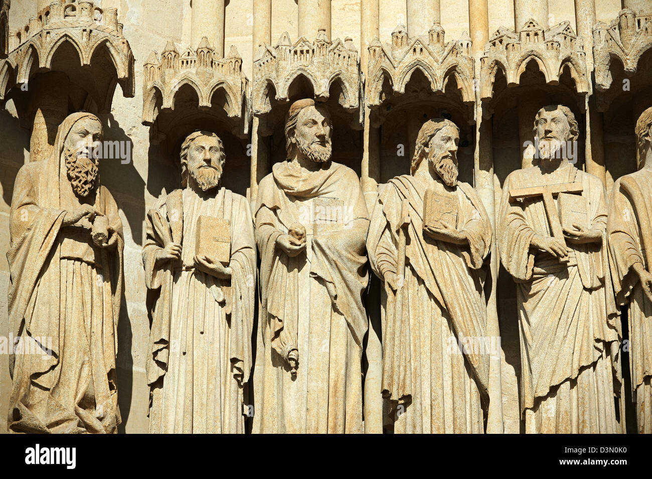 Gothic statues of an array of saints. Gothic Cathedral of Notre-Dame ...
