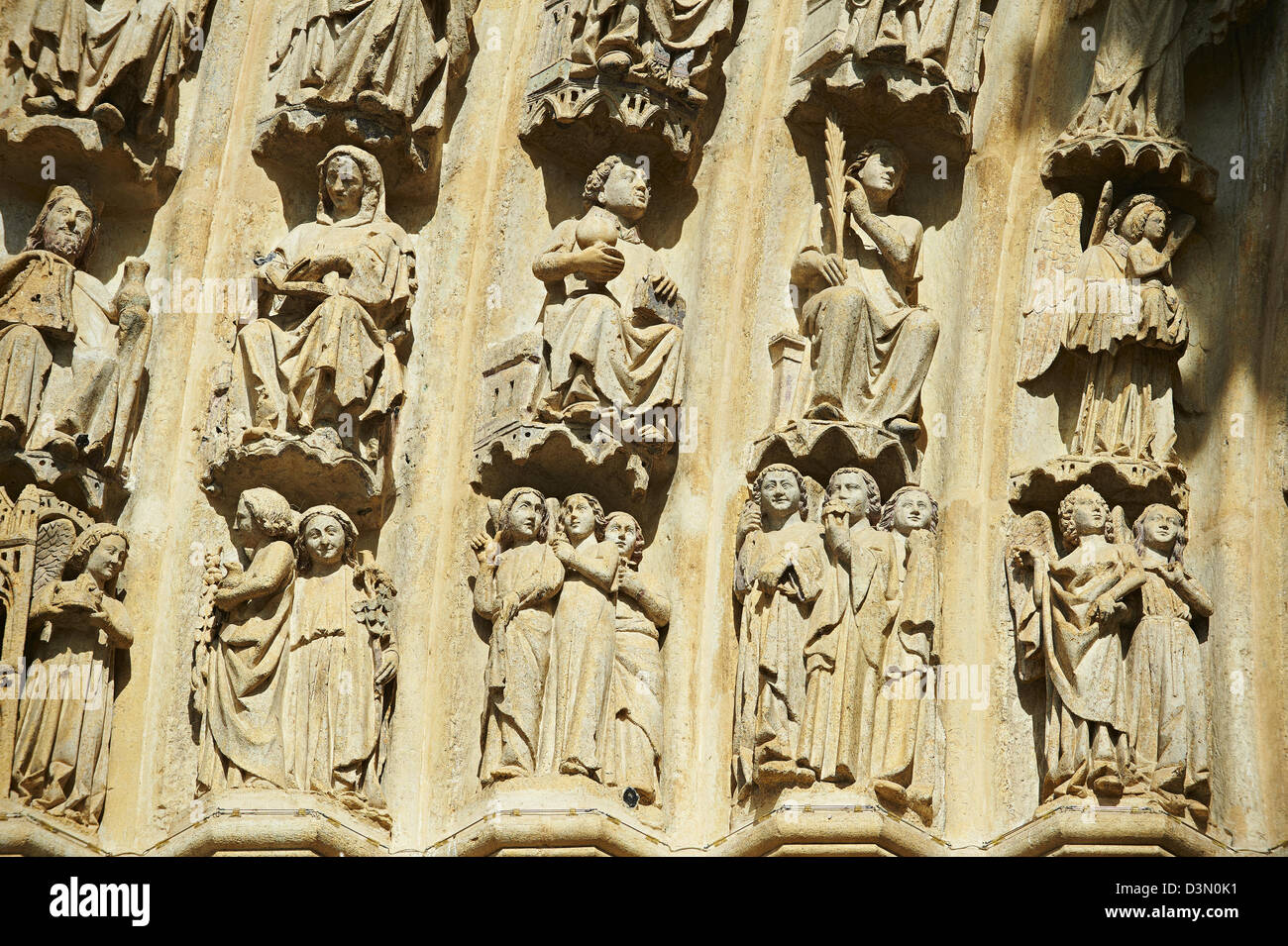 Gothic statues of an array of saints. Gothic Cathedral of Notre-Dame ...
