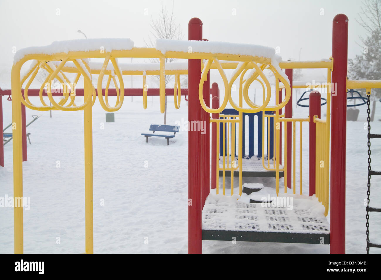 Playground equipment after a winter snow Stock Photo - Alamy