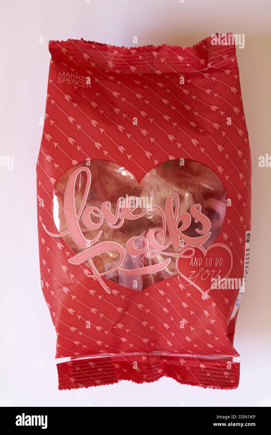 Packet of Marks & Spencer Love Rocks and so do you isolated on white ...