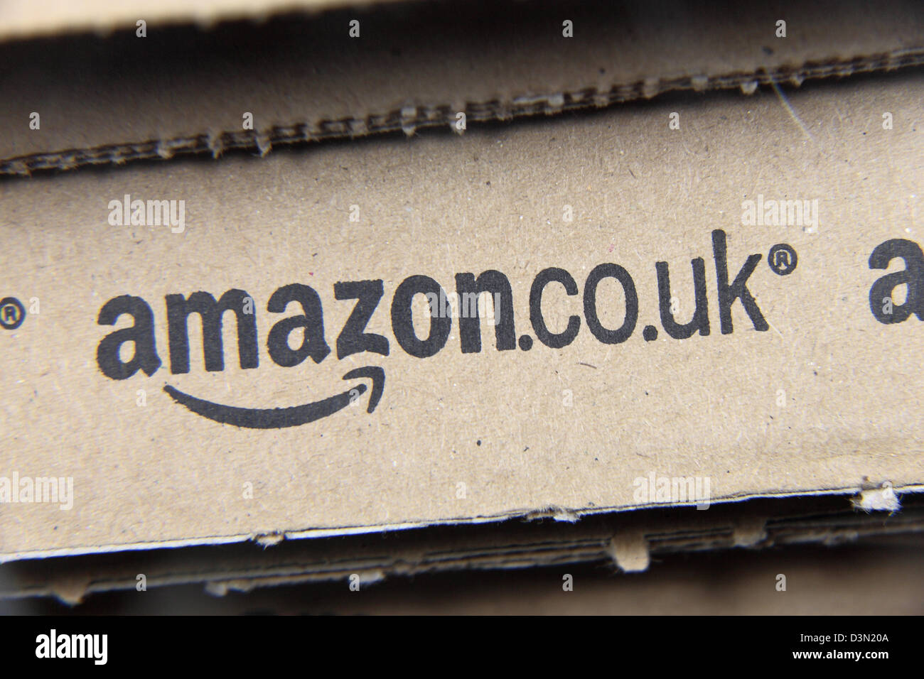 Close up of Amazon packaging used in the UK, focusing on Amazon.co.uk ...