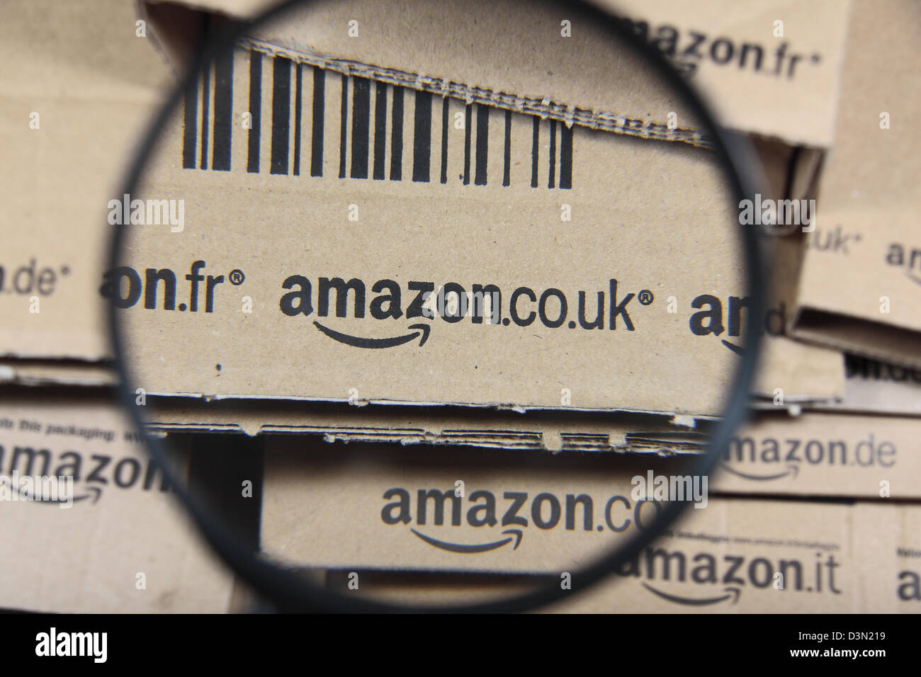 Close up of Amazon packaging used in the UK, with a magnifying glass ...