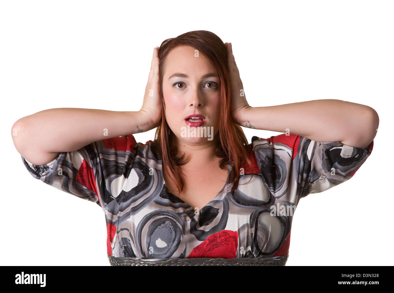 Woman covering her ears Stock Photo - Alamy