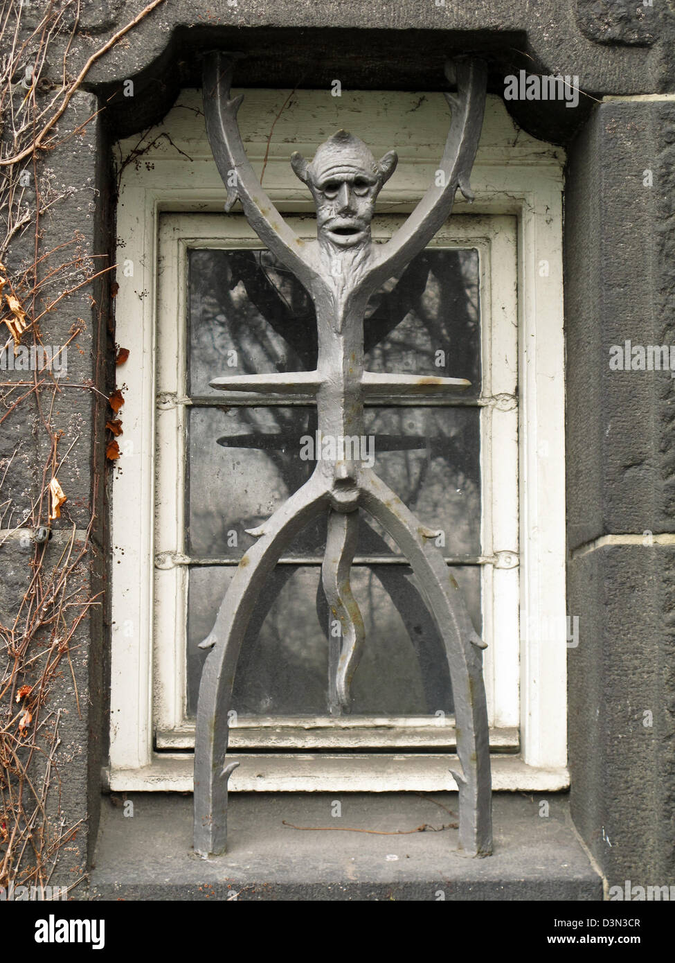The devil as a window grate at the city hall in copenhagen; denmark ...