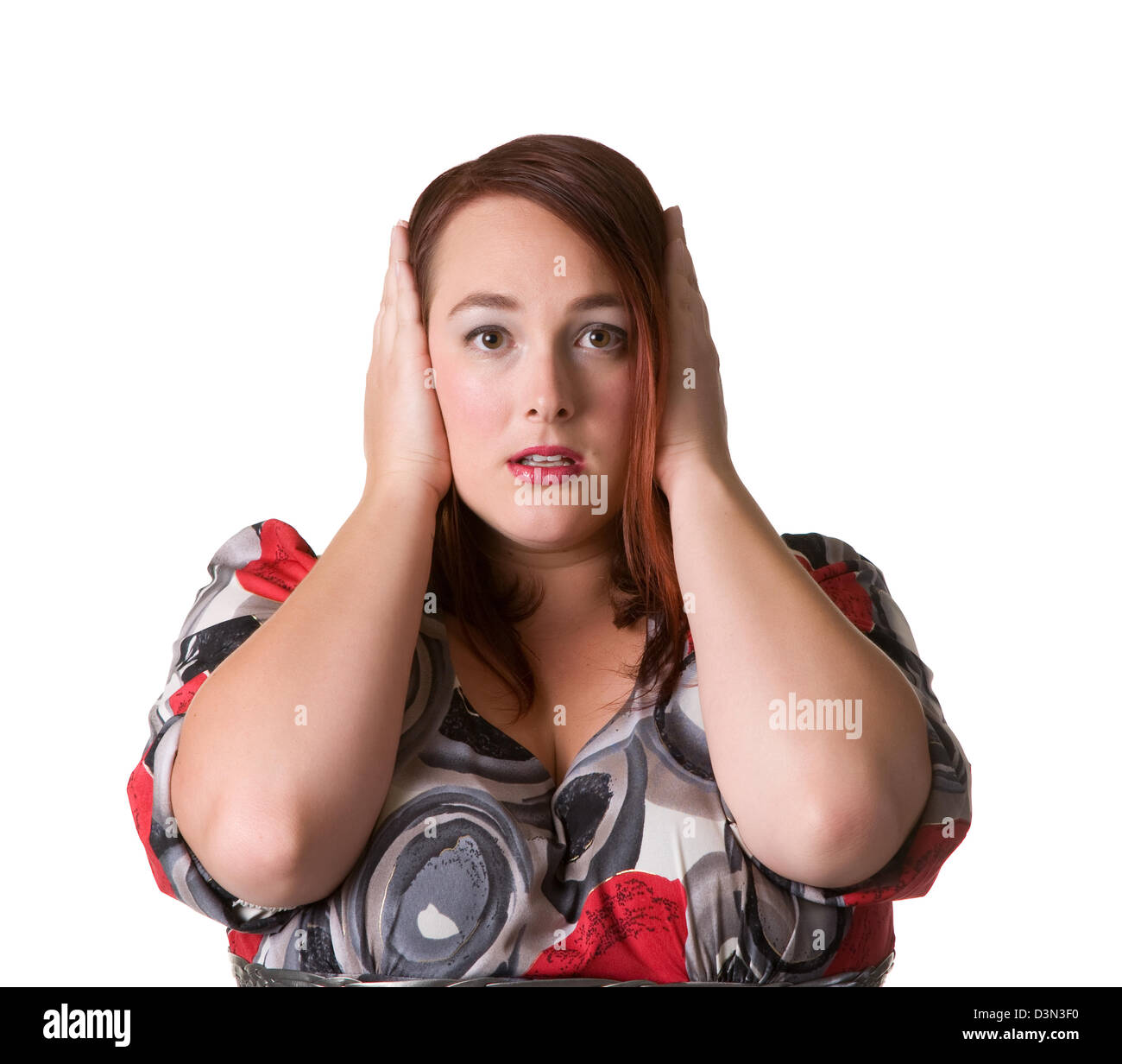 Woman covering her ears Stock Photo - Alamy