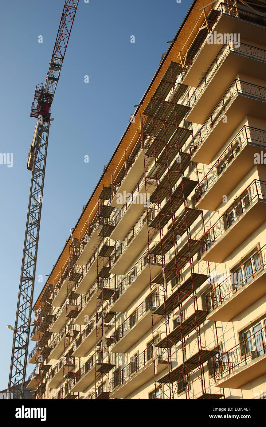 Tall building construction site Stock Photo - Alamy
