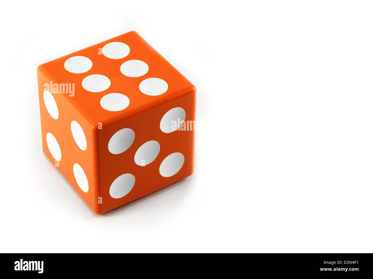 Orange dice isolated on white Stock Photo - Alamy